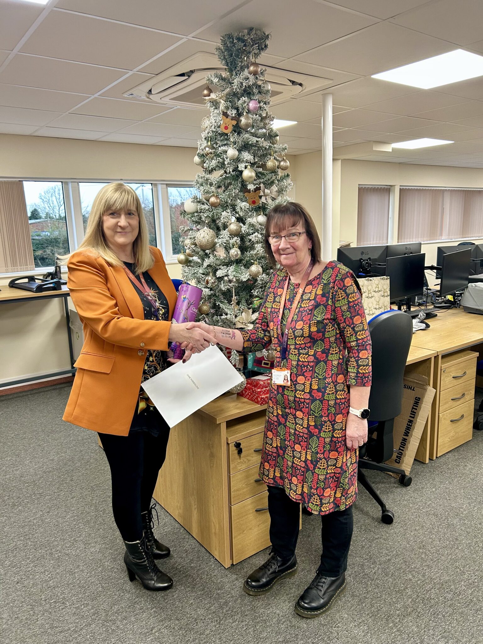 Diane Purseglove receives her 25 year gift. - AF Switchgear